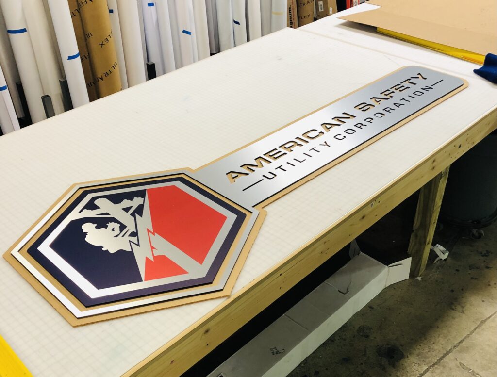 Multi-Layer Signs Add Depth and Impact · Telepathic Graphics